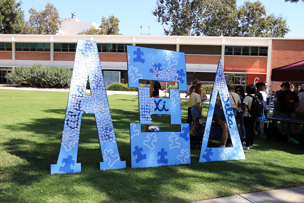 AXID raises awareness for autism speaks - The Poly Post
